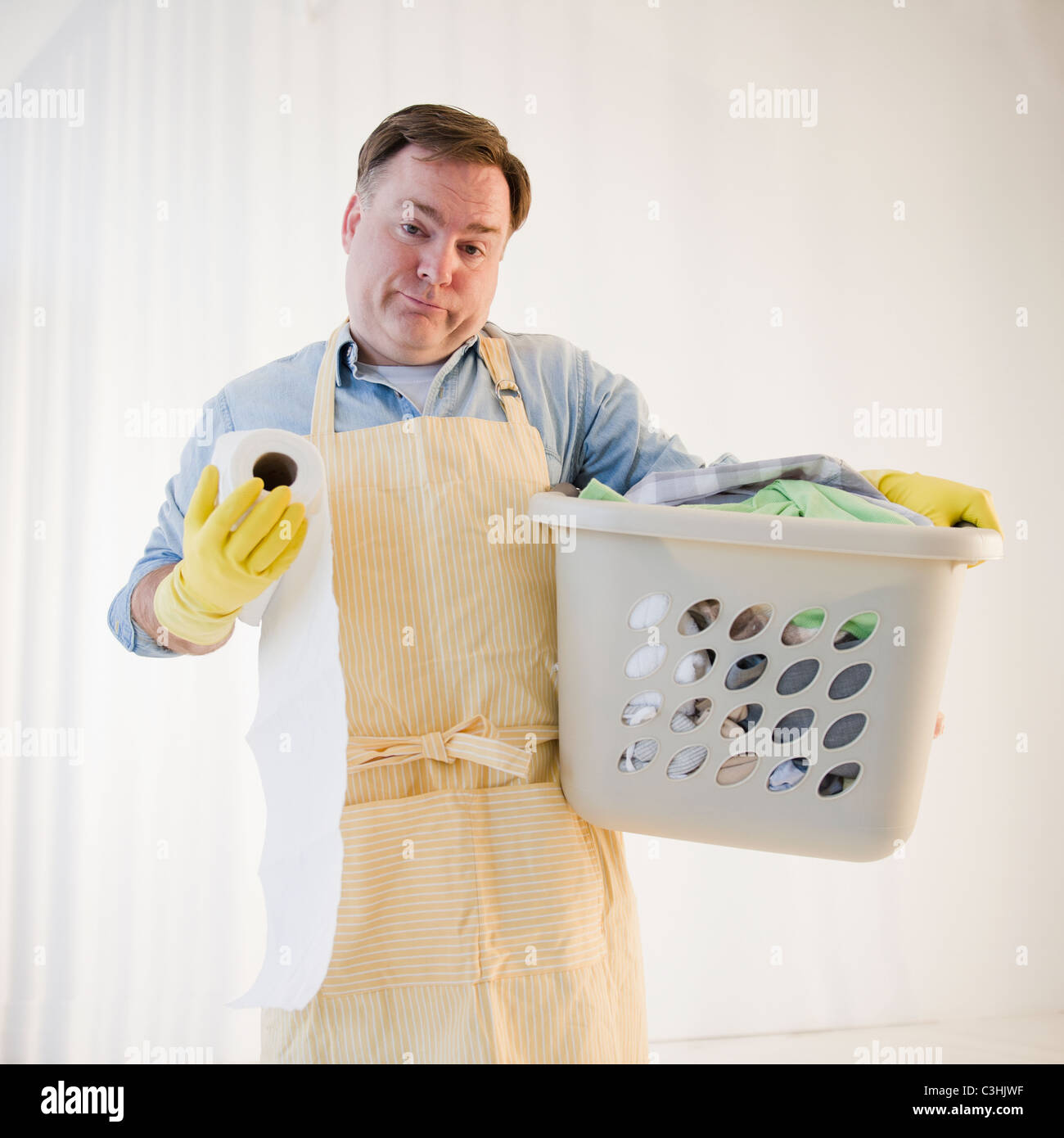 Man doing laundry Stock Photo - Alamy