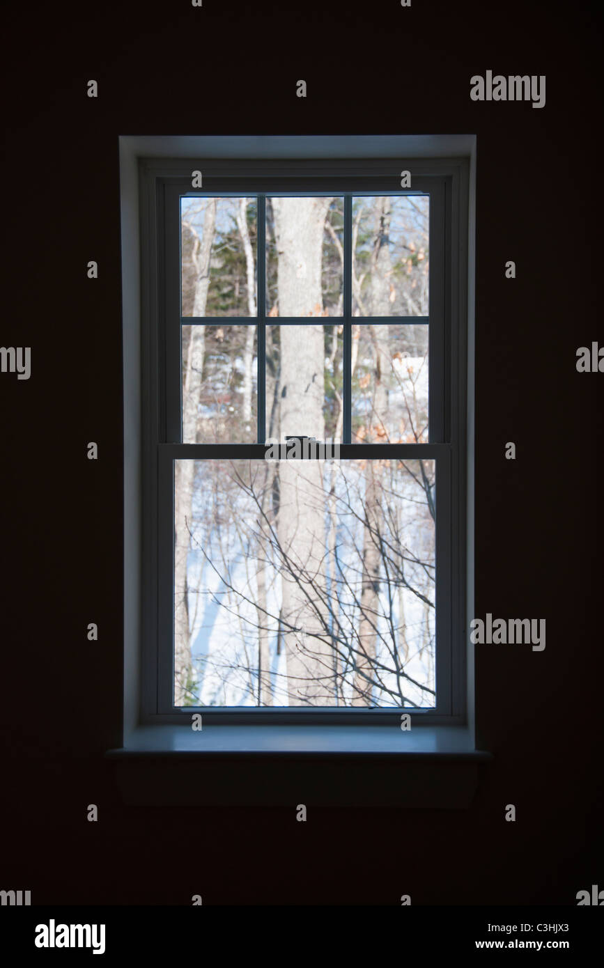 Dark room with window Stock Photo - Alamy