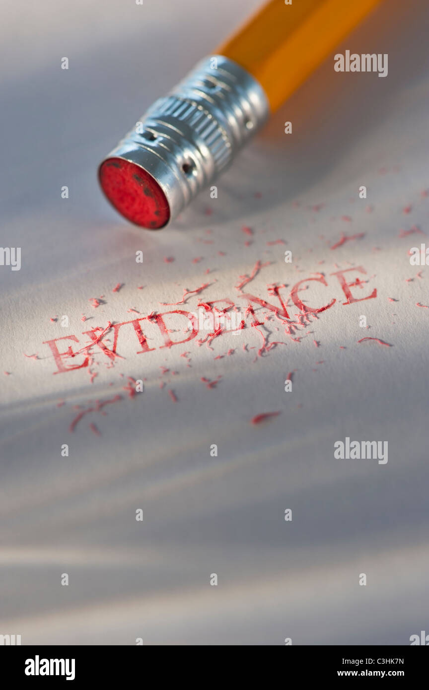 Studio shot of pencil erasing the word evidence from piece of paper ...