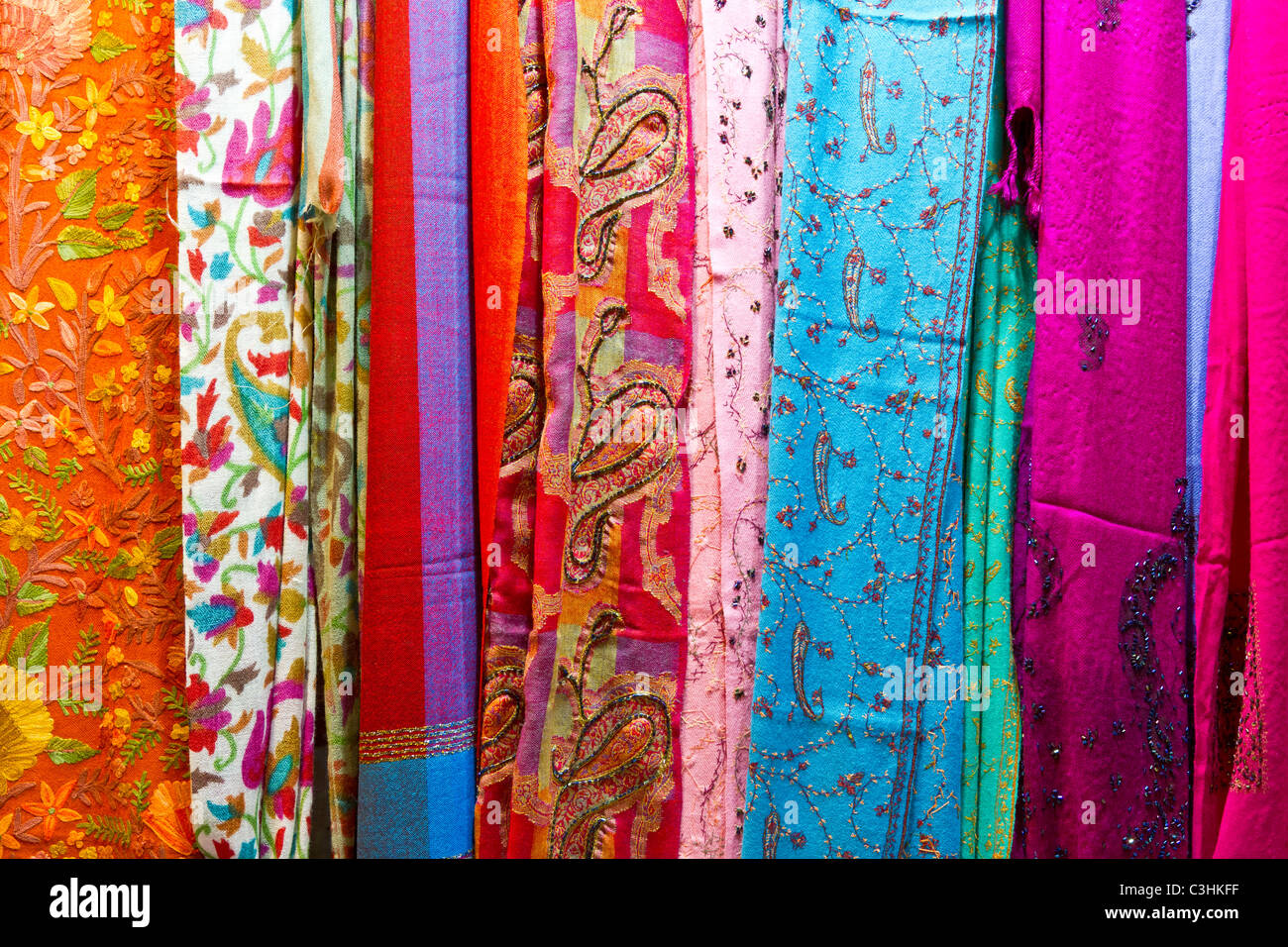 Closeup of textiles, scarves and shawls for sale at the Muttrah souq ...