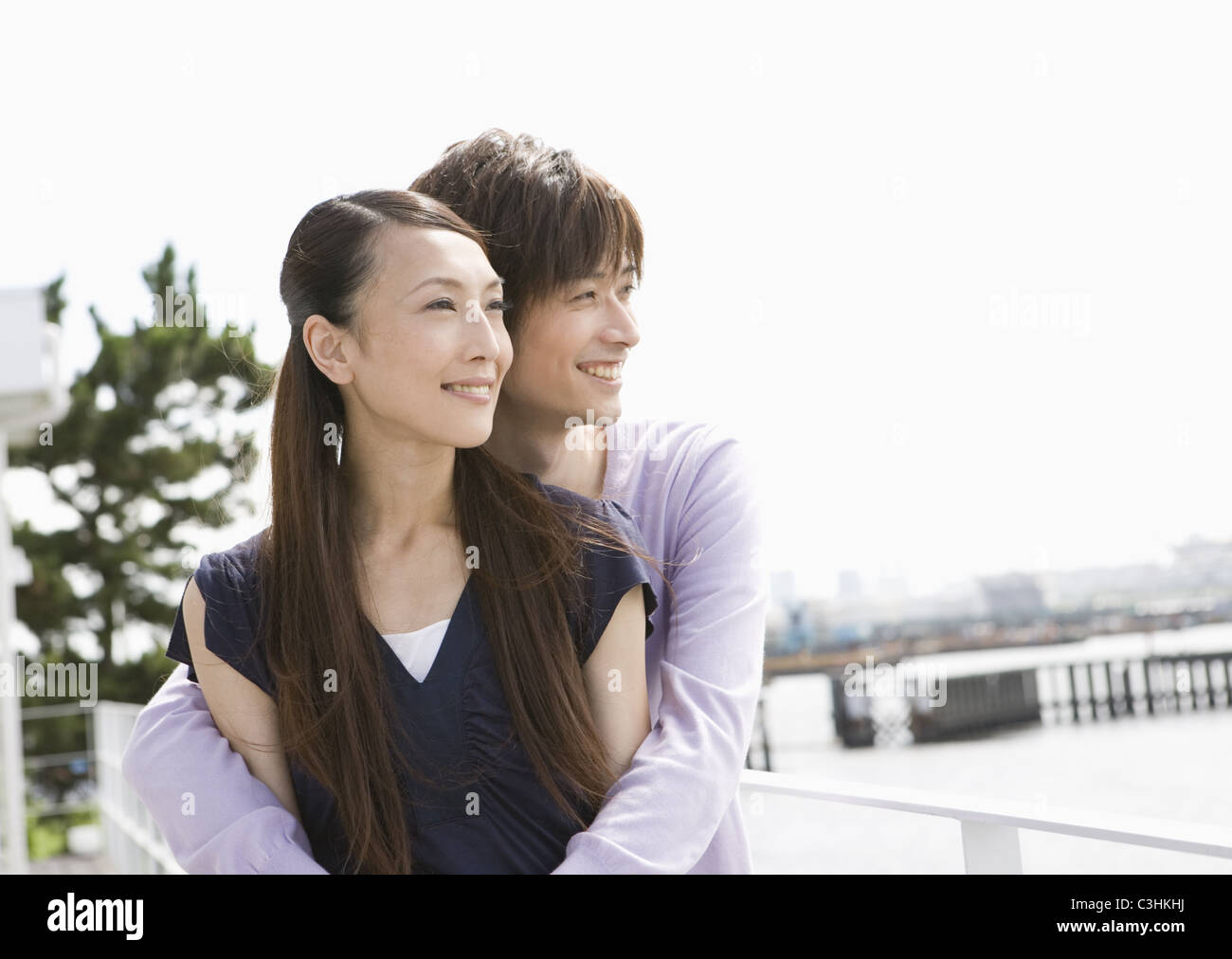 Couple cuddling up Stock Photo - Alamy