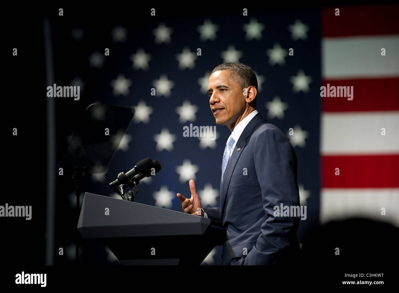 U.S. President Barack Obama speaks from the stage at a political fund ...