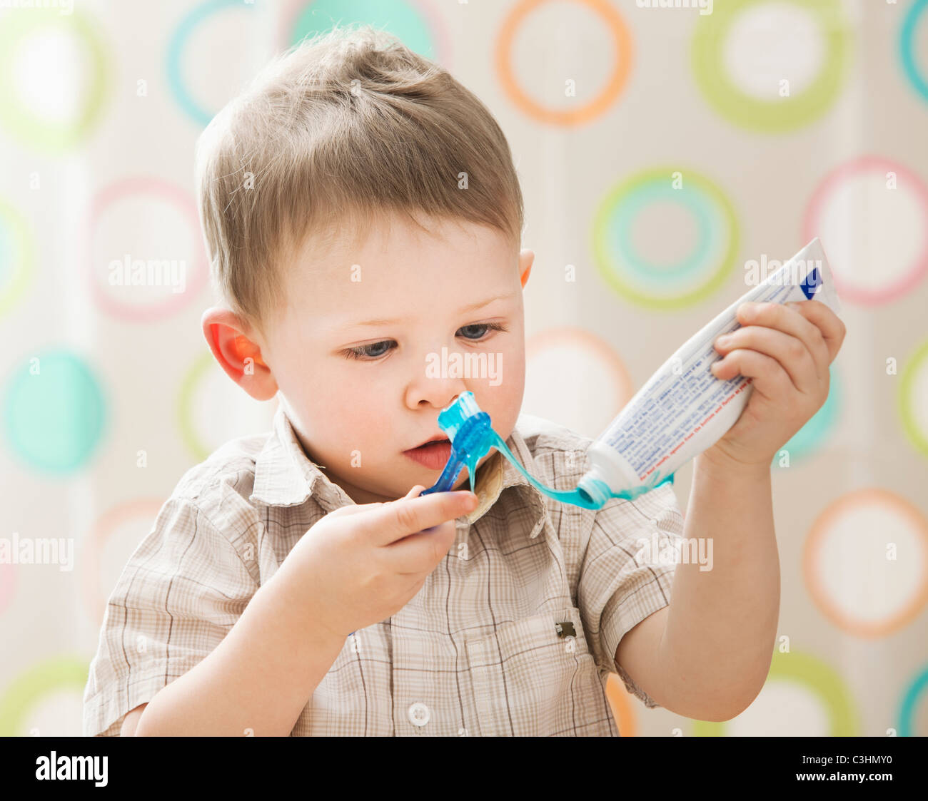 Boy (2-3) brushing teeth Stock Photo - Alamy