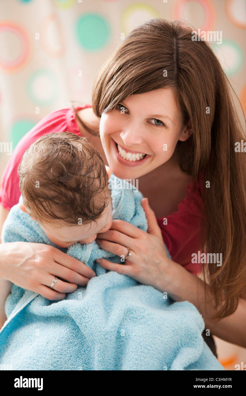 Mother son wrapped in towel hi-res stock photography and images - Alamy