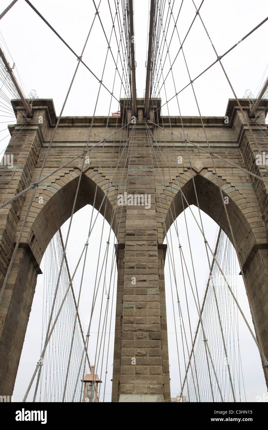 Black and white upward image of the Brooklyn Bridge in New York Stock ...