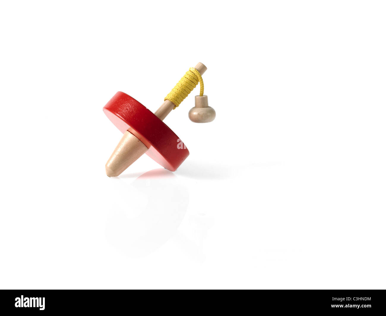 Studio shot of spinning top Stock Photo - Alamy