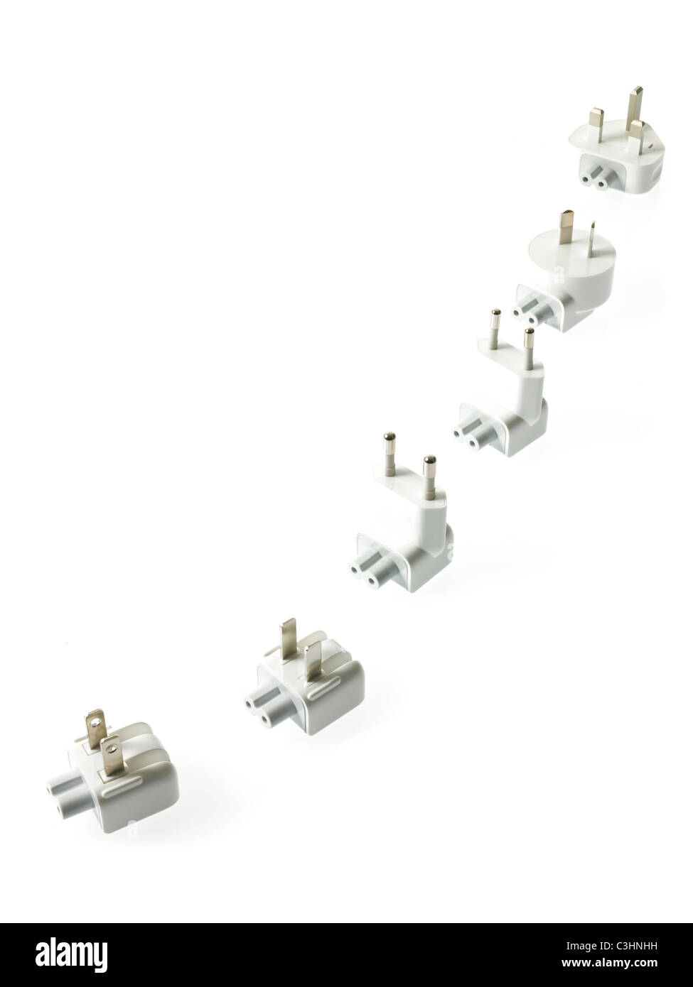 Row of plugs on white background Stock Photo - Alamy