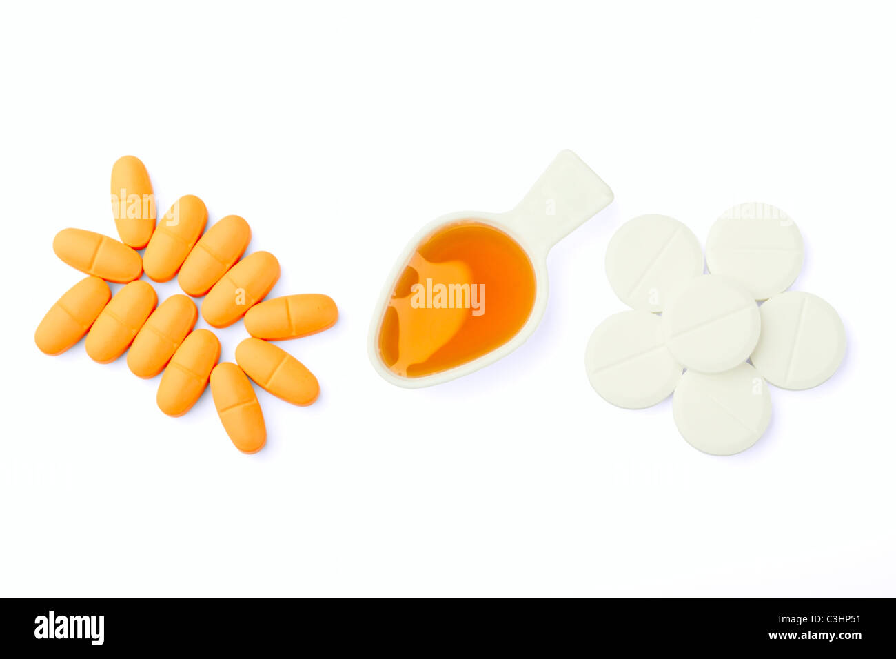 tablets and a medical syrup isolated on a white background Stock Photo ...