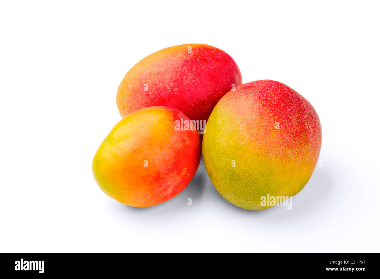three fruits of mango isolated on a white background Stock Photo - Alamy