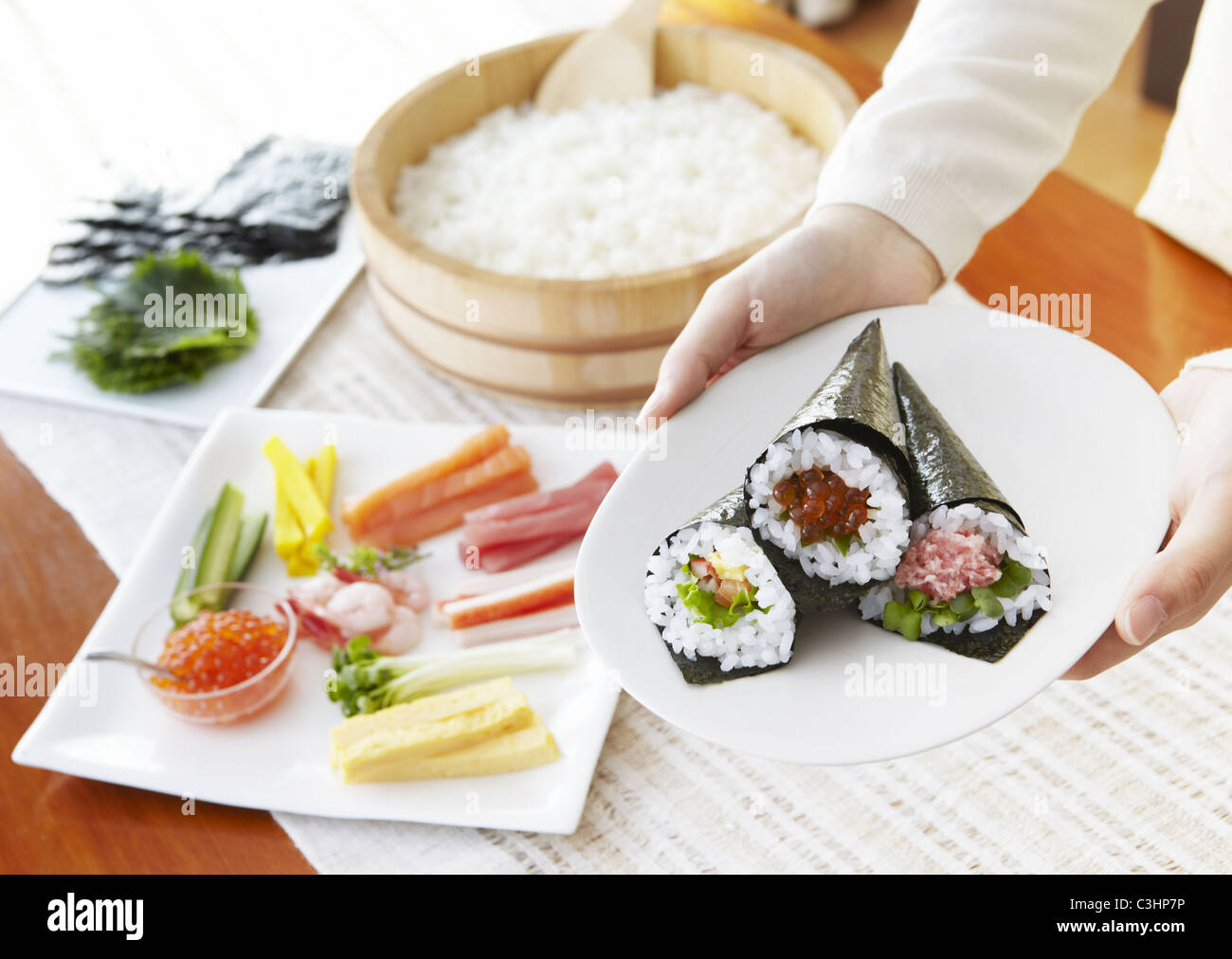 Hand rolled sushi hi-res stock photography and images - Alamy