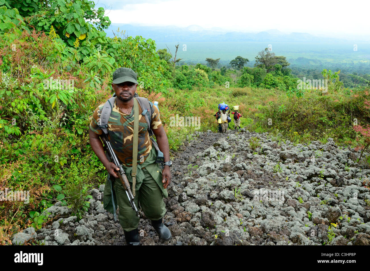 Hiking on Nyiragongo active volcano in the Alpine region of Virunga ...