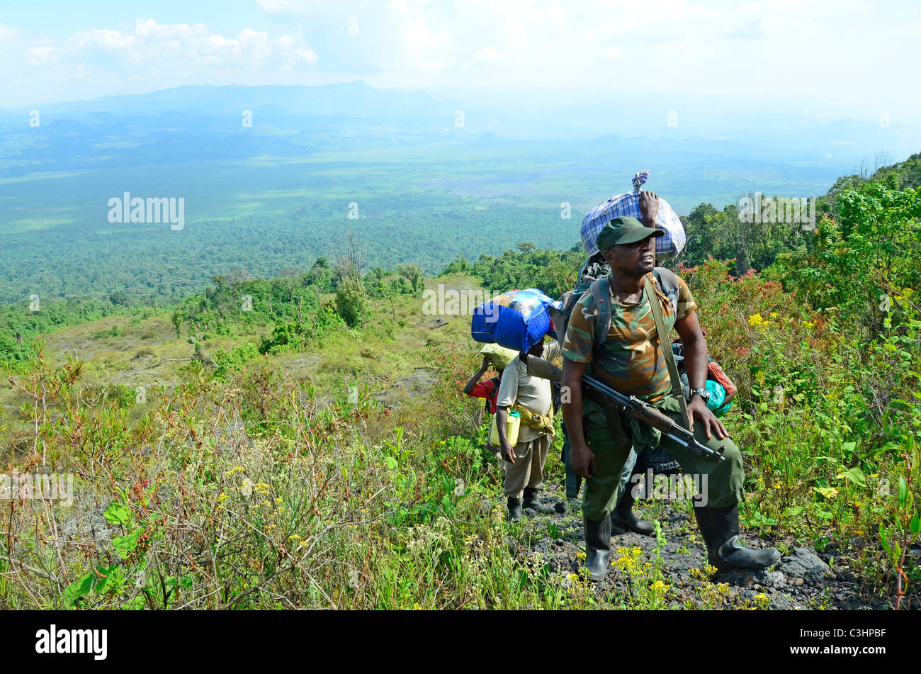 Hiking on Nyiragongo active volcano in the Alpine region of Virunga ...