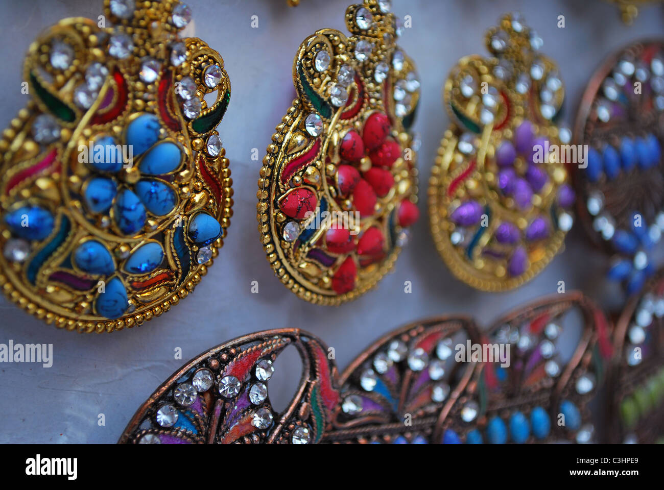 ear stud in road side shop Stock Photo - Alamy