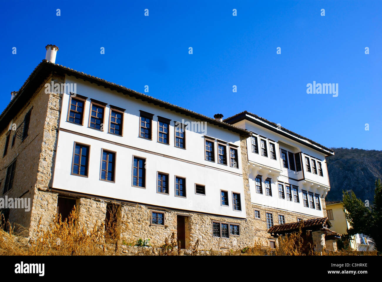 Stone traditional house in Kastoria city (Macedonia, Greece Stock Photo ...
