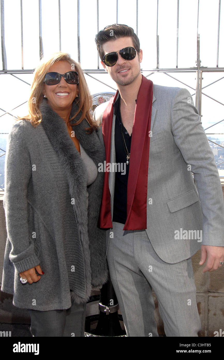 Denise Rich and Robin Thicke Denise Rich and Robin Thicke light the ...