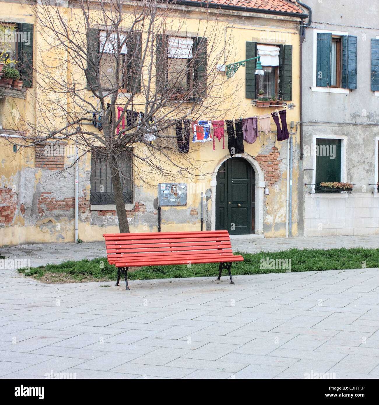 Red bench, Venice, Italy Stock Photo - Alamy
