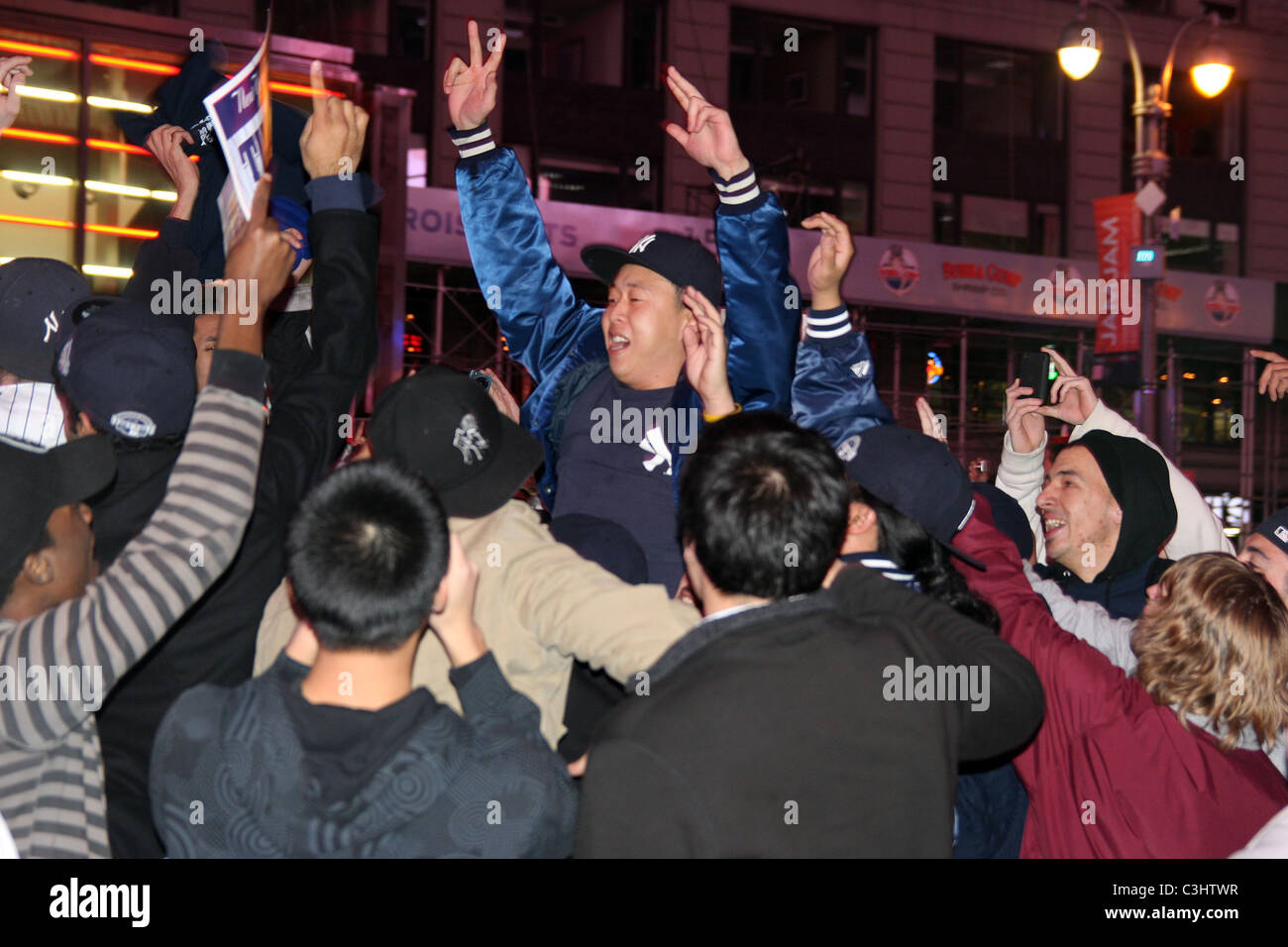 Atmosphere Yankees fans gather together in Times Square to celebrate ...