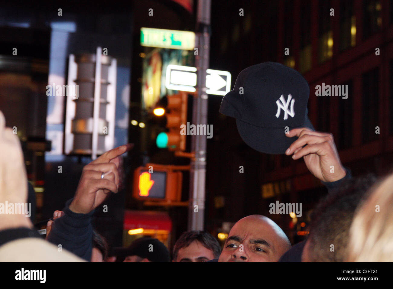 Atmosphere Yankees fans gather together in Times Square to celebrate ...