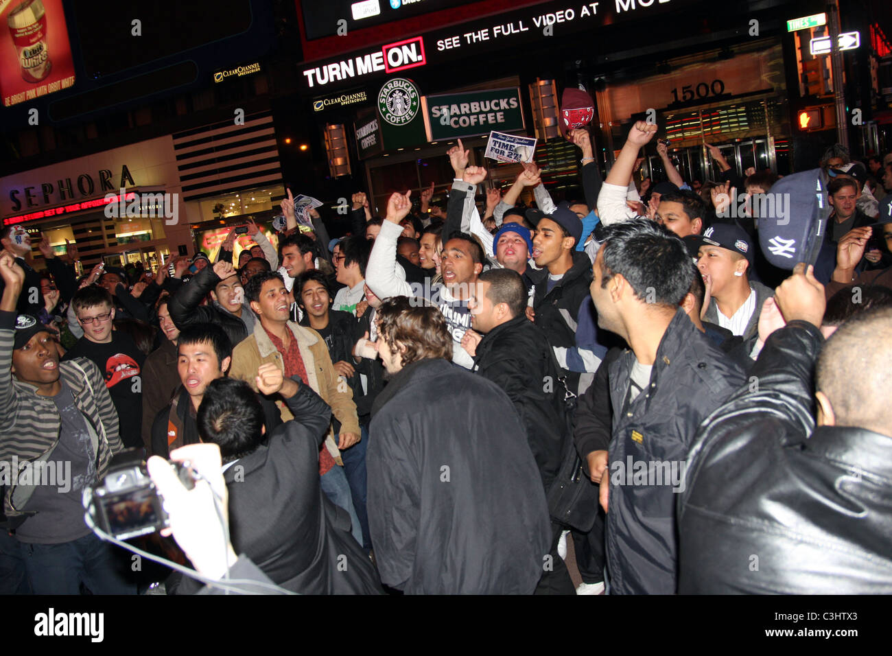 Atmosphere Yankees fans gather together in Times Square to celebrate ...
