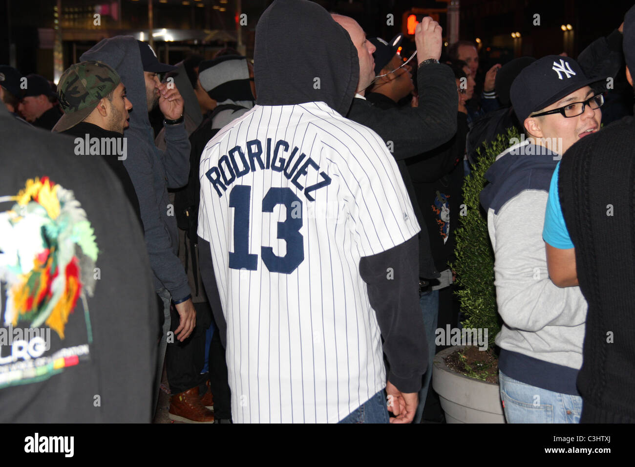 Atmosphere Yankees fans gather together in Times Square to celebrate ...