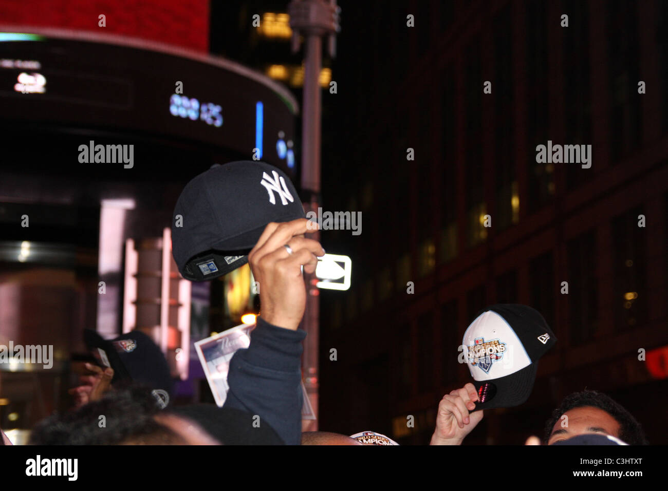 Atmosphere Yankees fans gather together in Times Square to celebrate ...
