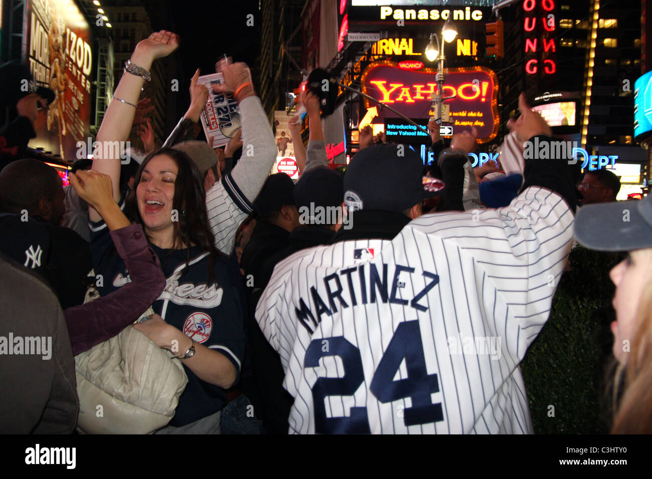 Atmosphere Yankees fans gather together in Times Square to celebrate ...