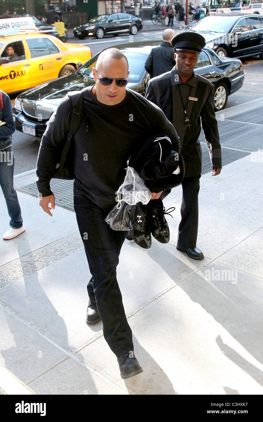 Dwayne 'The Rock' Johnson has his hands full while returning to his ...