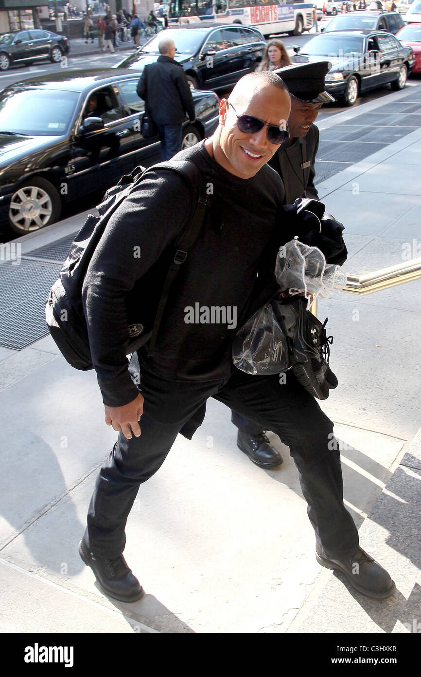 Dwayne 'The Rock' Johnson has his hands full while returning to his ...