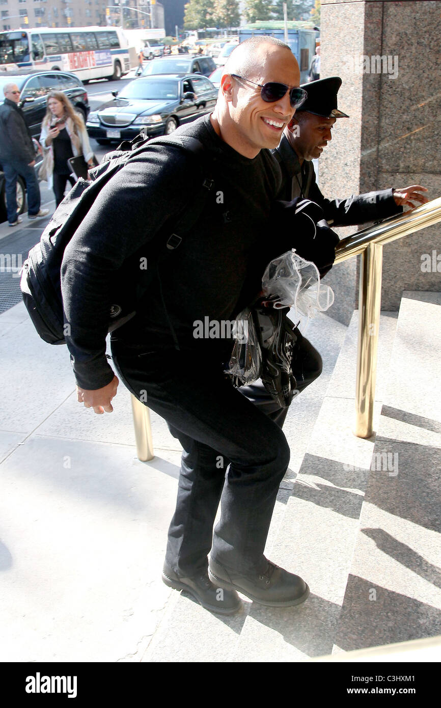 Dwayne 'The Rock' Johnson has his hands full while returning to his ...