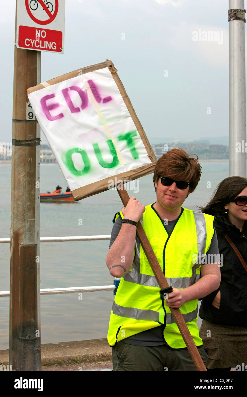 Anti-EDL banner at an AFL demonstration in Weymouth Stock Photo - Alamy