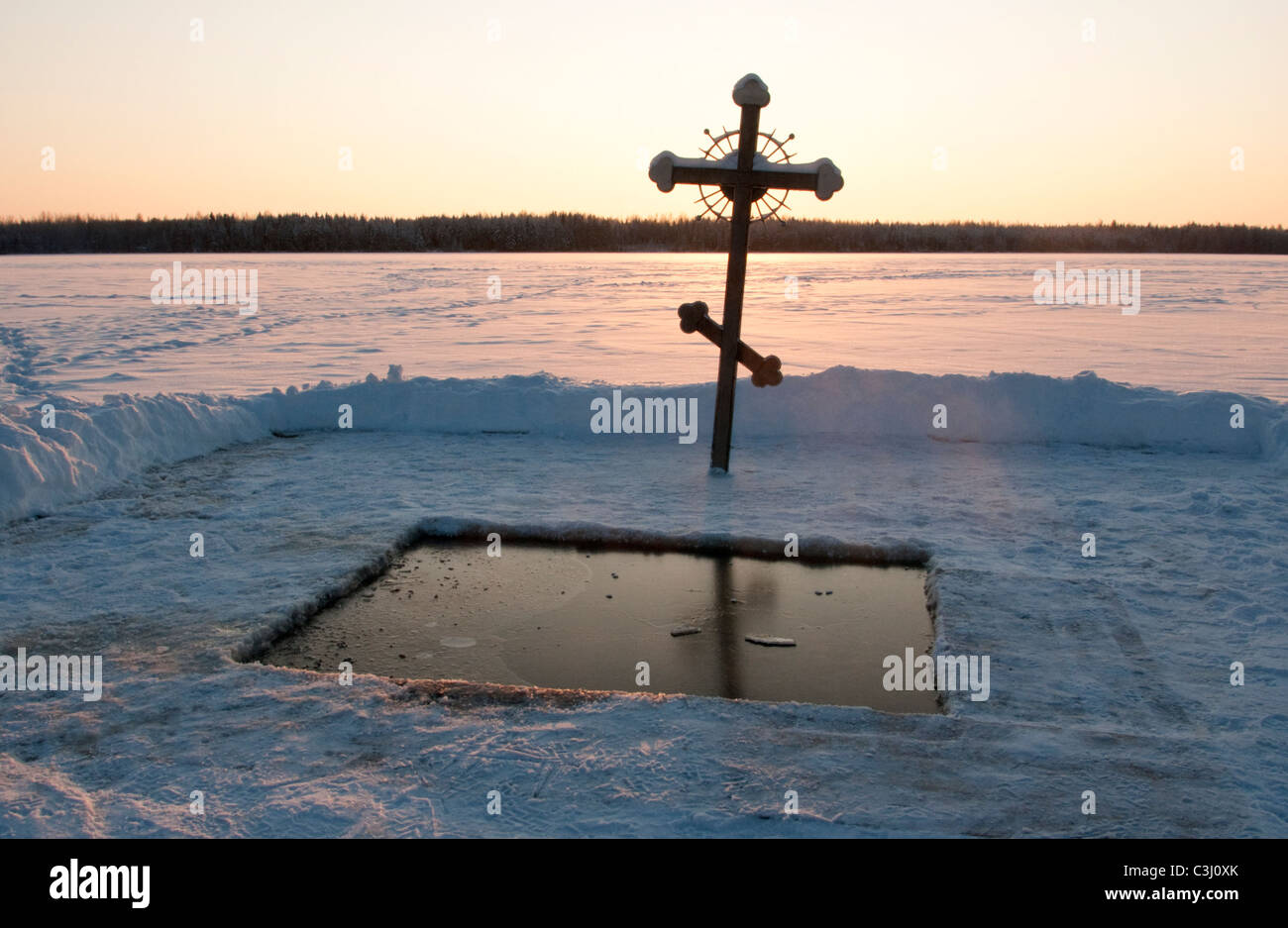 Cross standing next to the ice hole, in readiness for the Epiphany ...