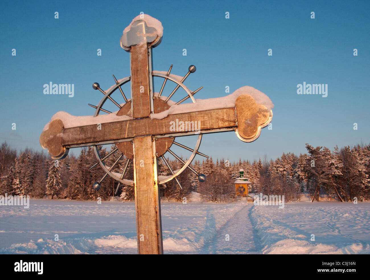 Cross standing next to the ice hole, in readiness for the Epiphany ...