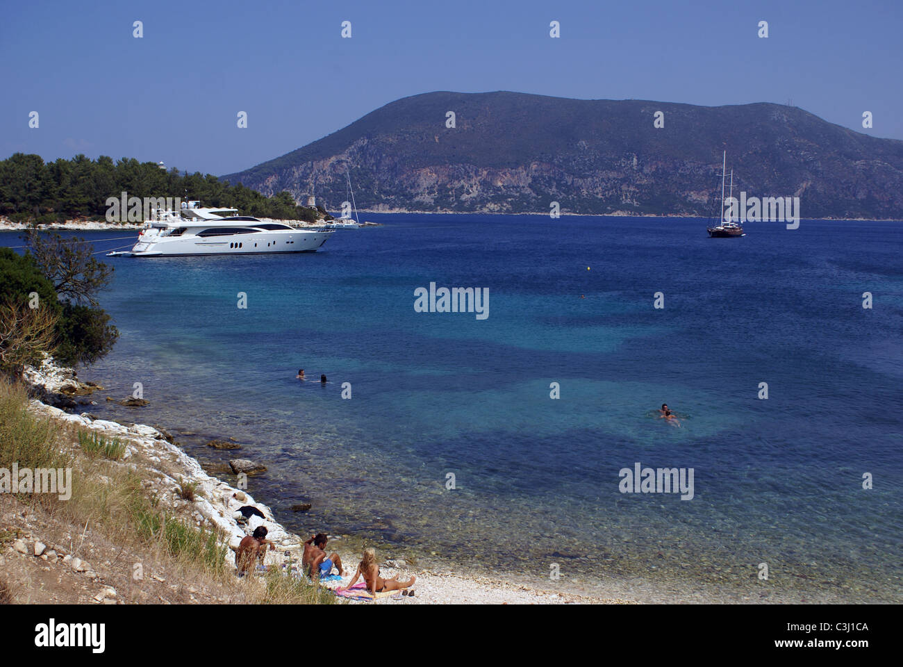 A beach near the village of Fiscardo in Kefalonia, overlooking the ...