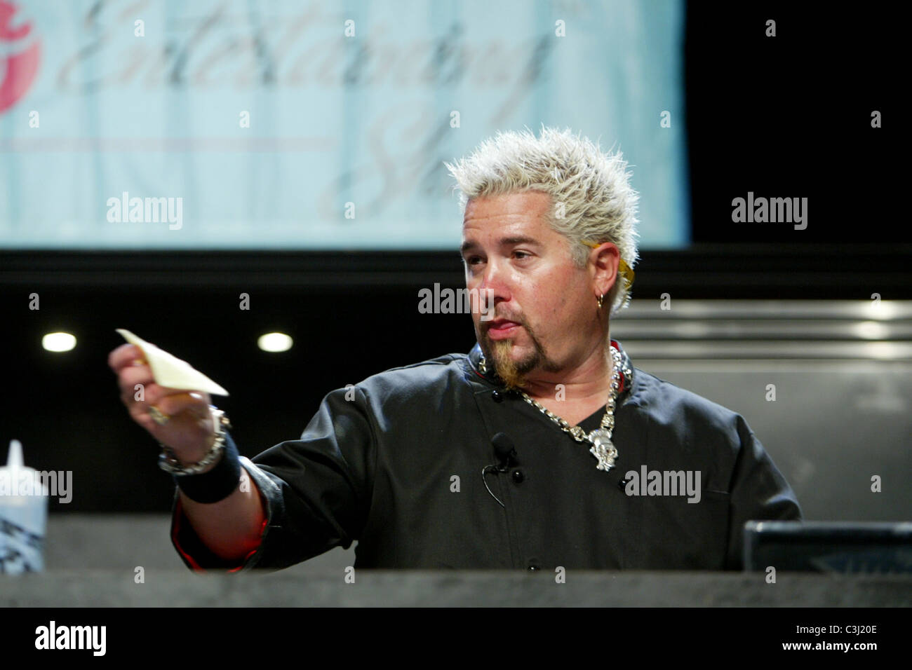 Guy Fieri presents a cooking demonstration during the Metropolitan ...