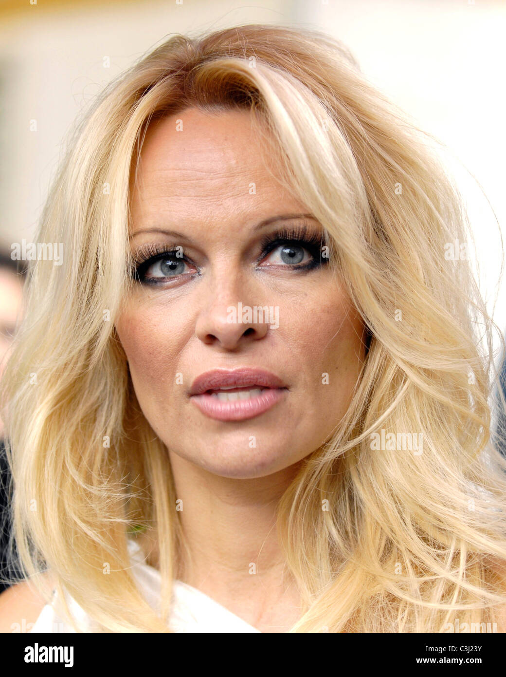 Pamela Anderson unveils PETA's new campaign against Canada's commercial ...