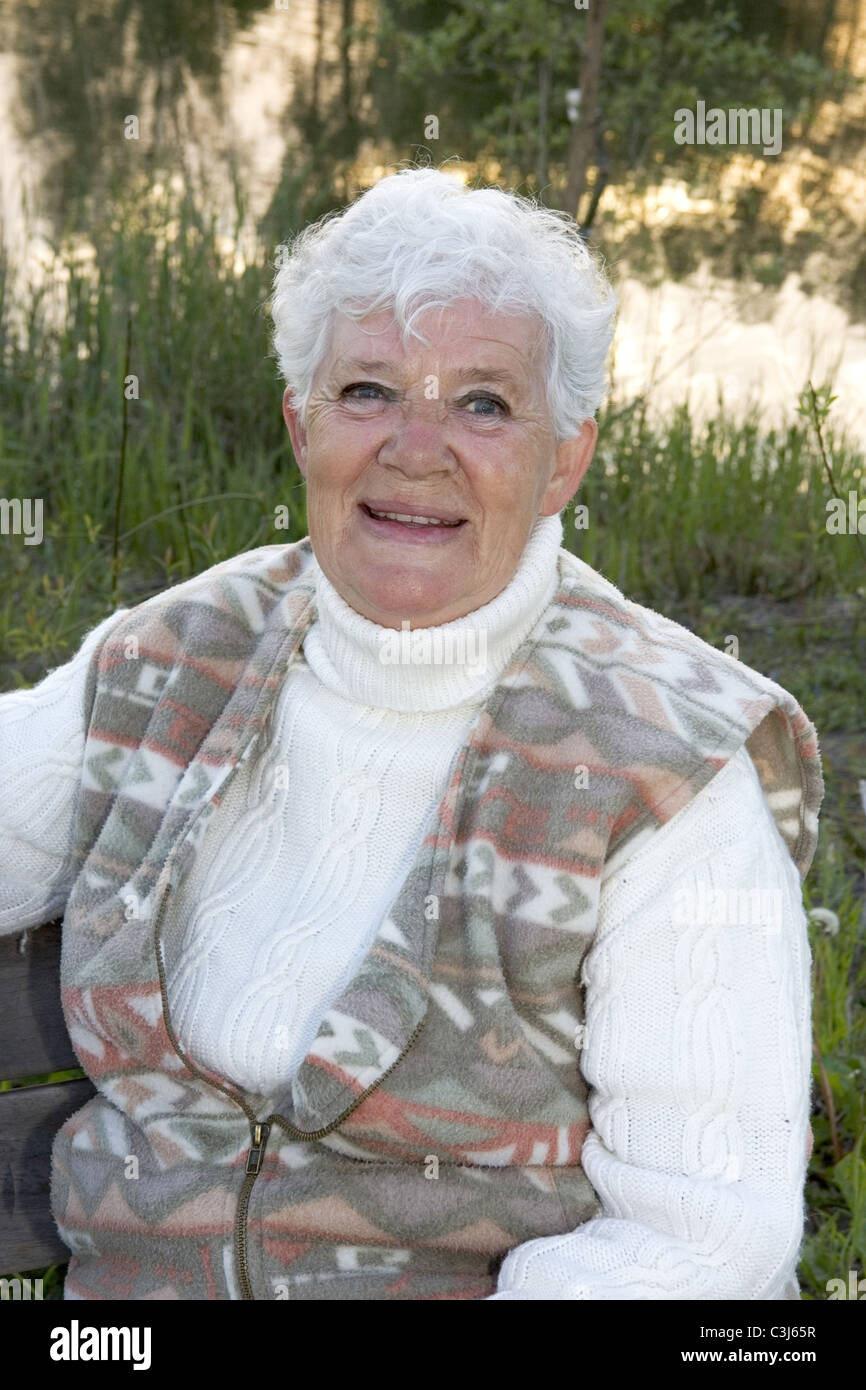 Portrait senior woman outside smiling Stock Photo - Alamy