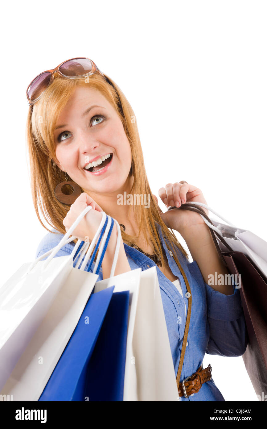 Shopping young woman with bag on white Stock Photo - Alamy