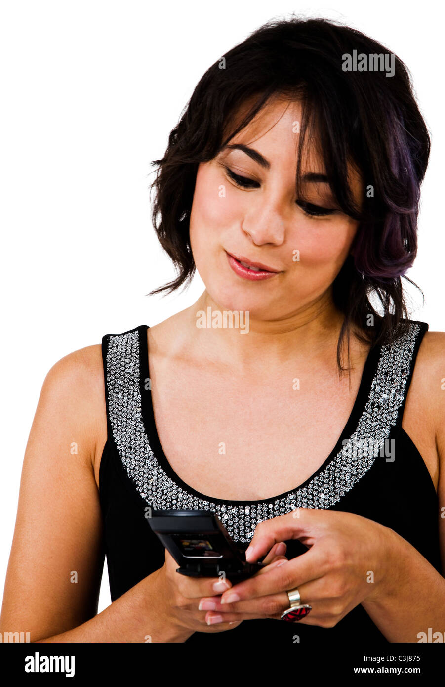 Young woman text messaging on a mobile phone isolated over white Stock ...