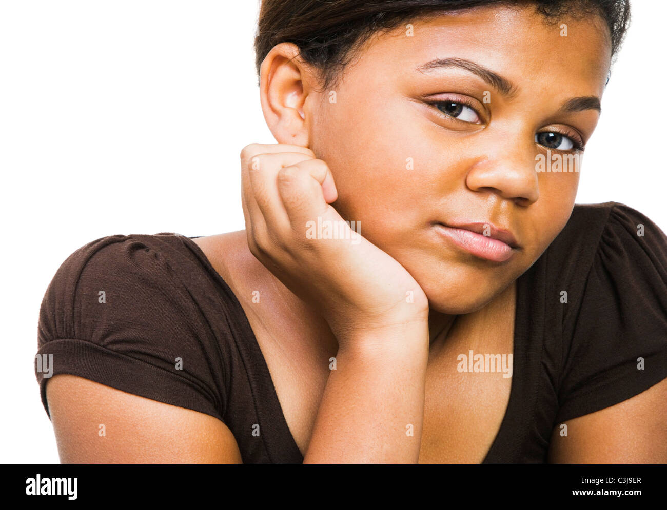 Pre adolescent girl posing isolated over white Stock Photo - Alamy