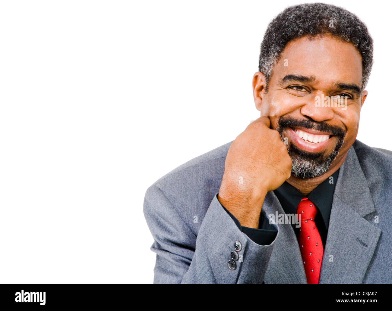 Businessman posing and smiling isolated over white Stock Photo - Alamy