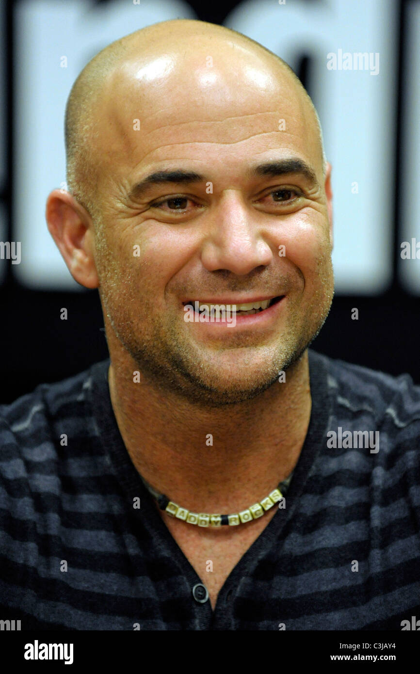 Andre Agassi signs copies of his new book 'Open' at the Indigo ...