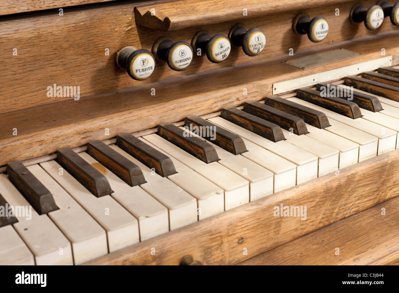 Keyboard and stops of a classic organ Stock Photo - Alamy
