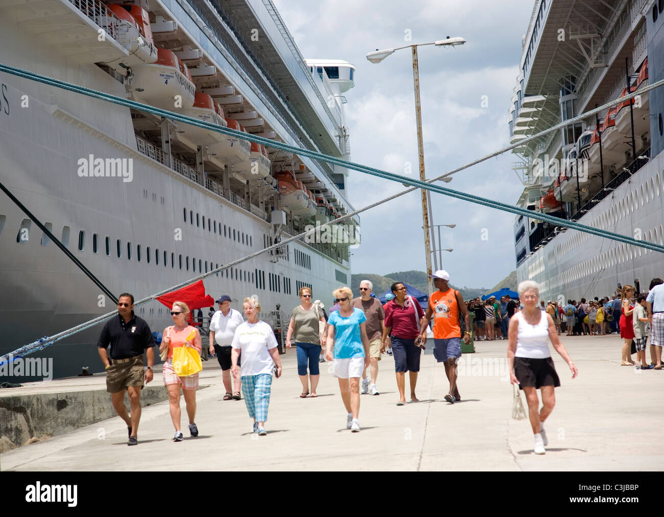 Cruise Liner Passengers disembark at Dock in St Johns - Antigua Stock ...