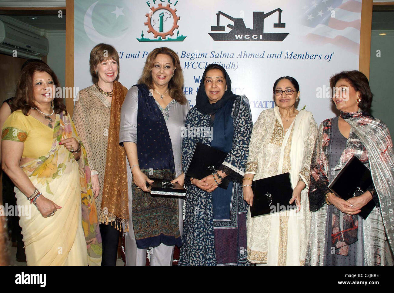 A group photo of Dr.Marilyn Wyatt, wife of the US Ambassador, with ...