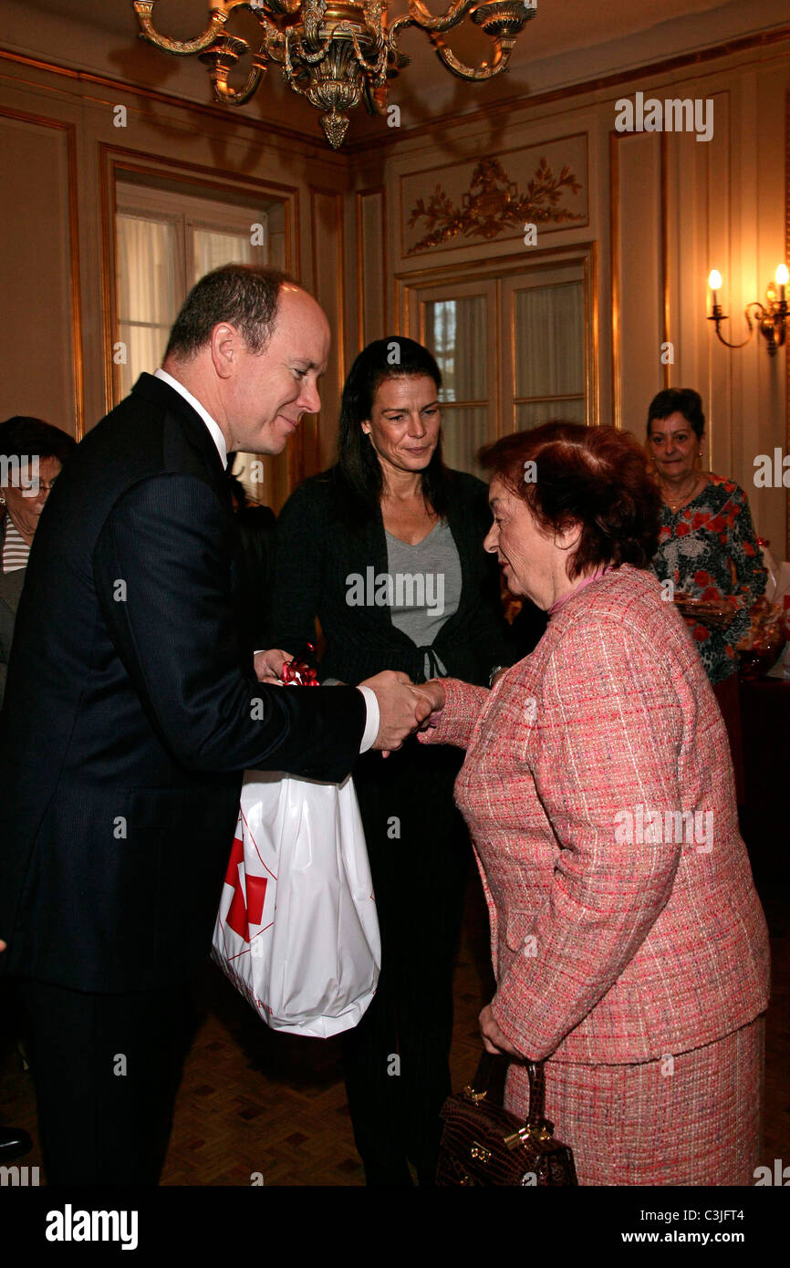 Prince Albert II of Monaco and Princess Stephanie distribute gifts and ...