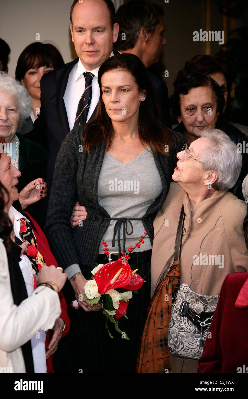 Prince Albert II of Monaco and Princess Stephanie distribute gifts and ...
