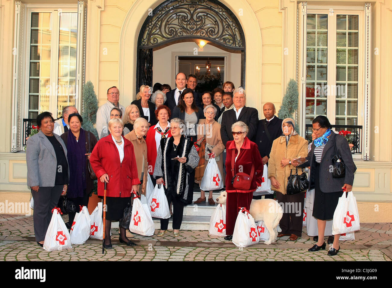 Prince Albert II of Monaco and Princess Stephanie distribute gifts and ...
