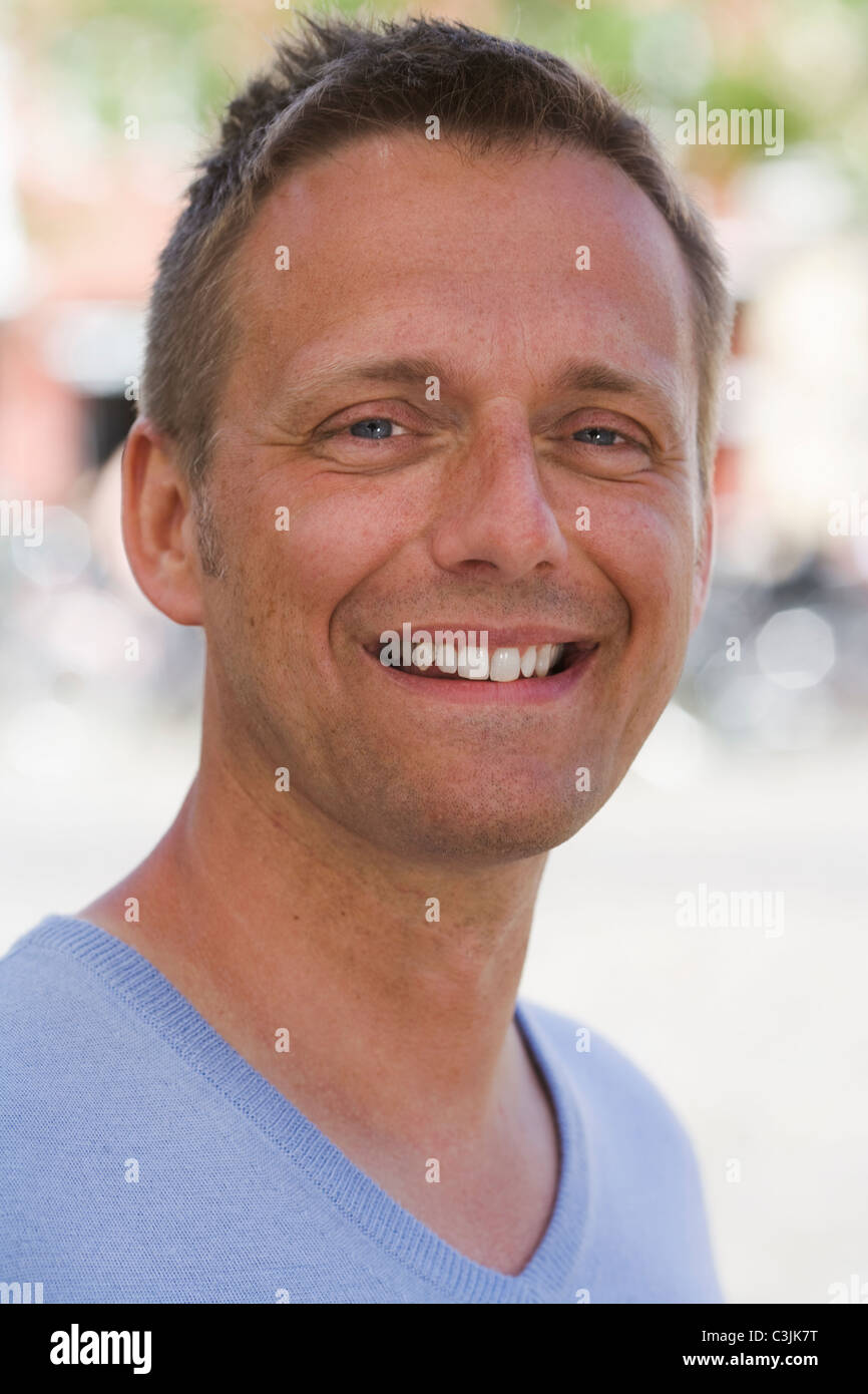 Half length posing smiling media hi-res stock photography and images ...