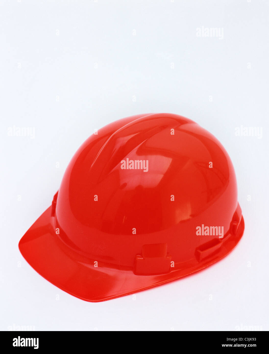 Hard Hat in safety red Stock Photo - Alamy