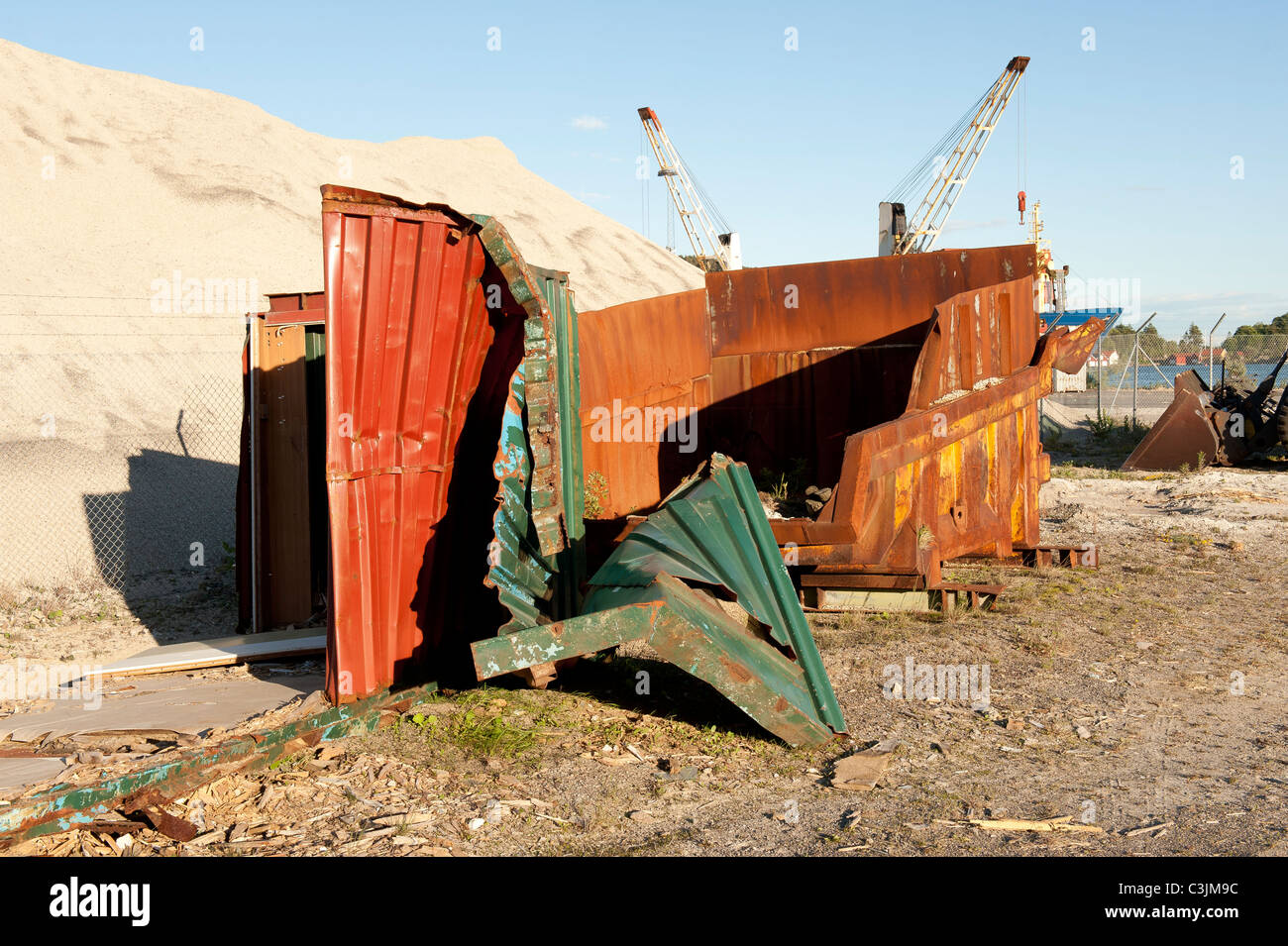 Ripped up metal container Stock Photo - Alamy